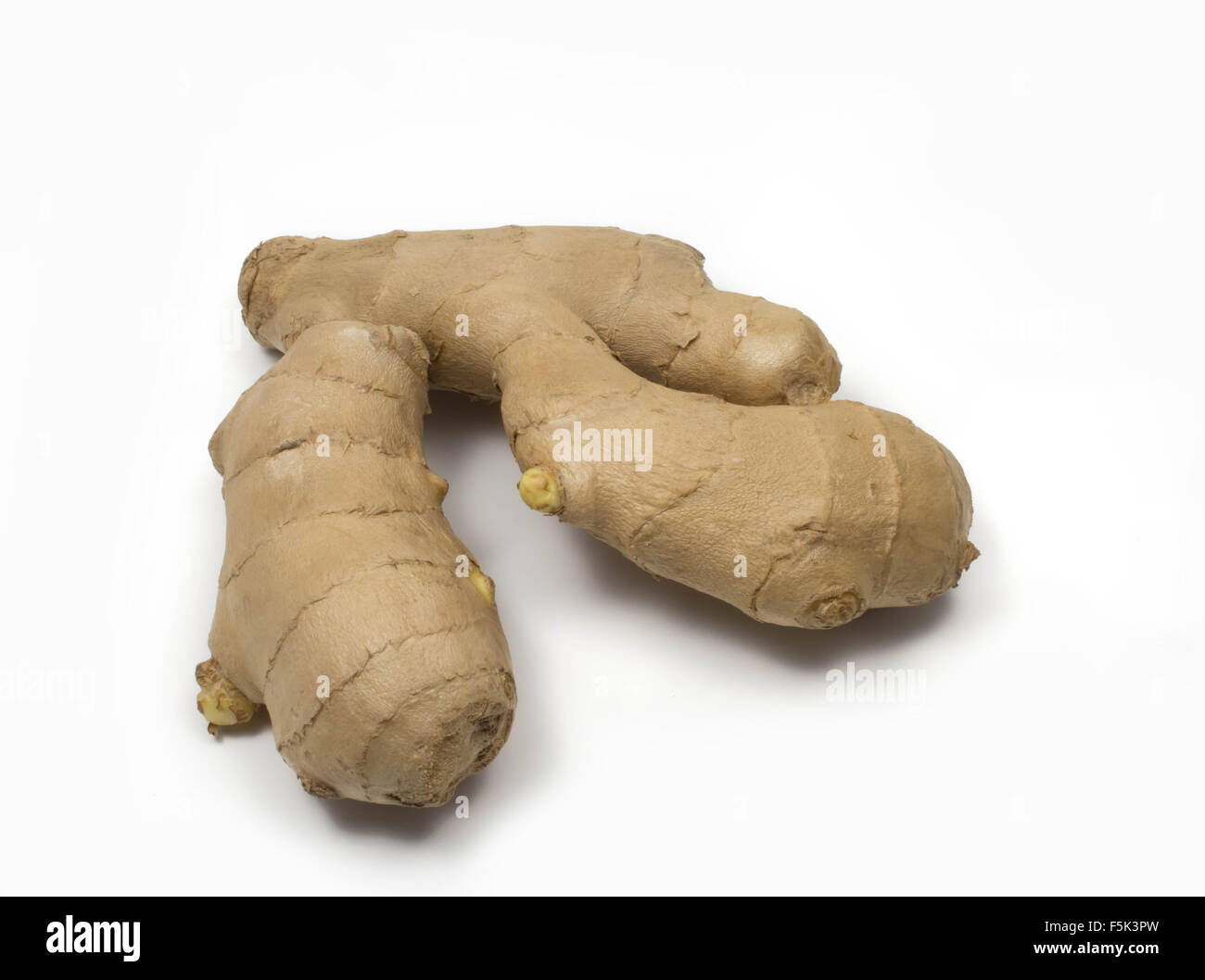 Fresh ginger isolated on white background Stock Photo - Alamy