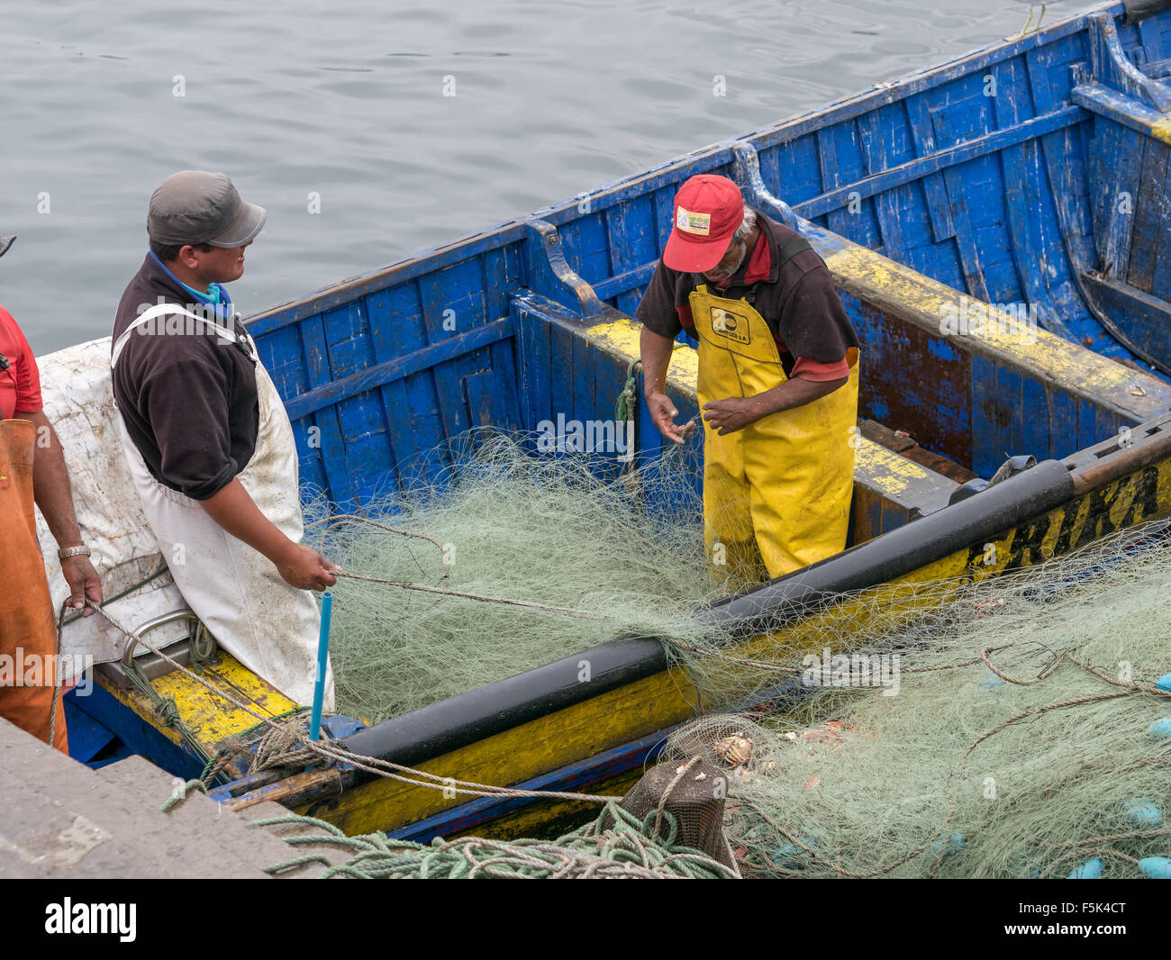 Fisherman on a Boat Stock Photo - Alamy