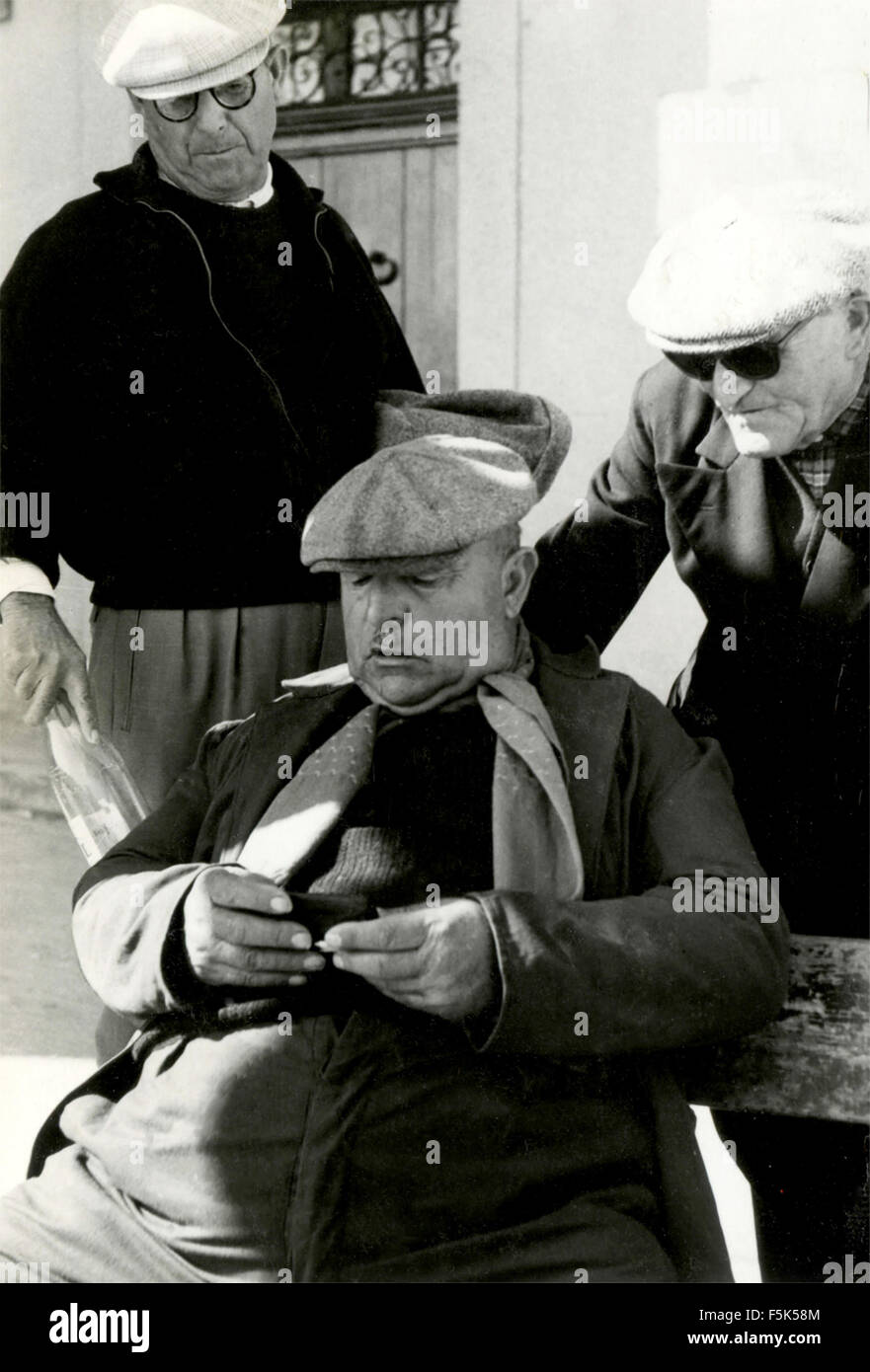Three old people in the street, Chassis , France Stock Photo - Alamy