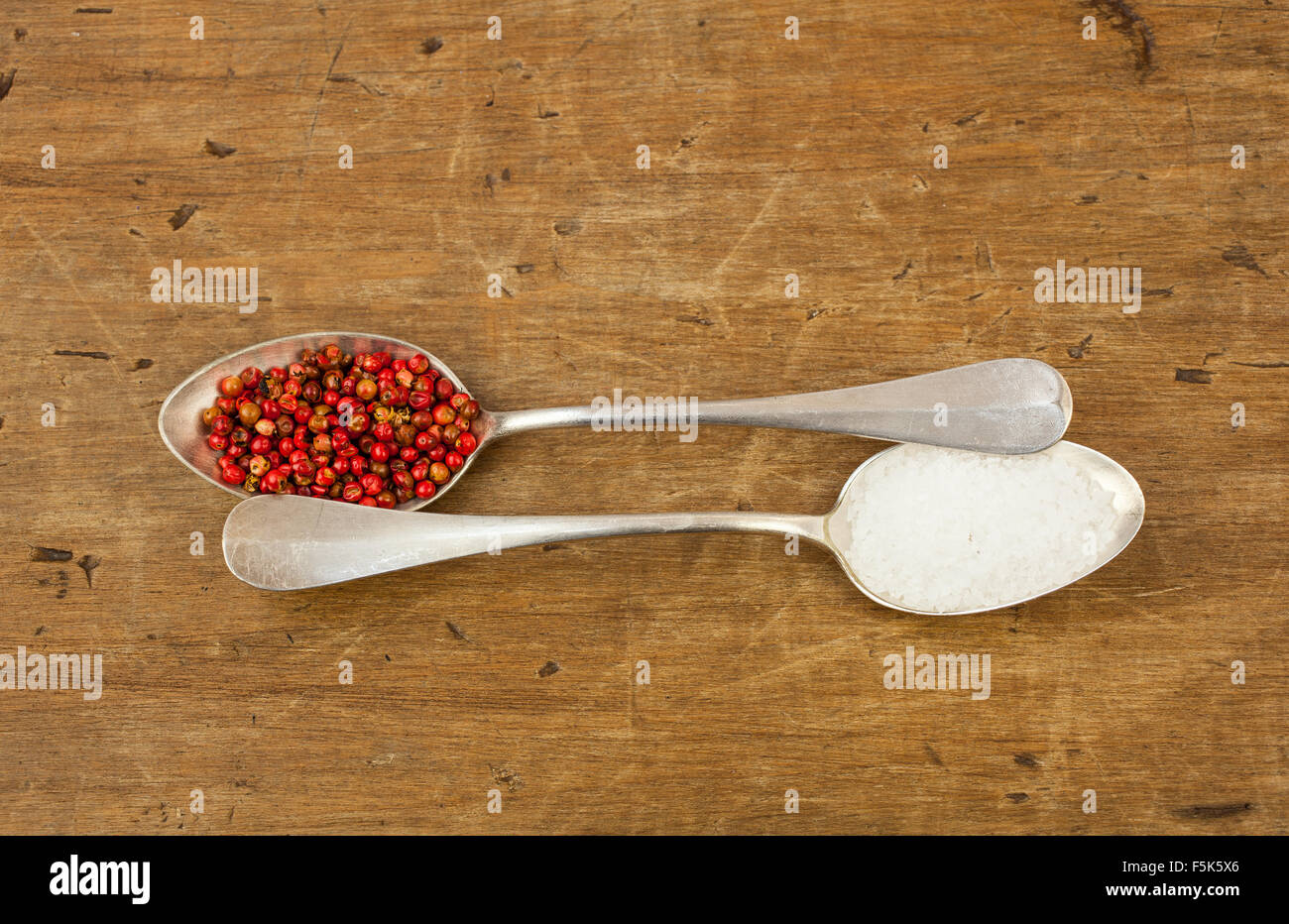 Cranberries and salt inside the spoons Stock Photo - Alamy