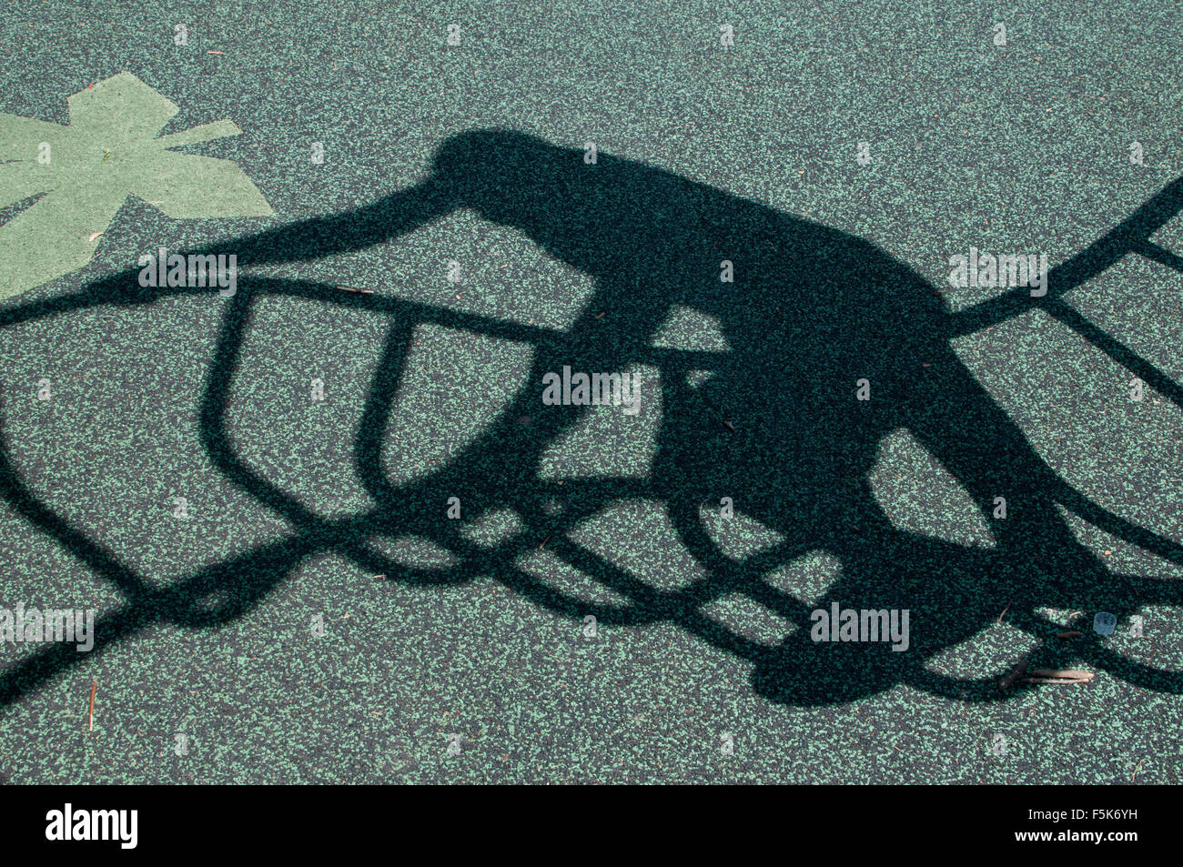 playground shadow of a child climbing Stock Photo - Alamy