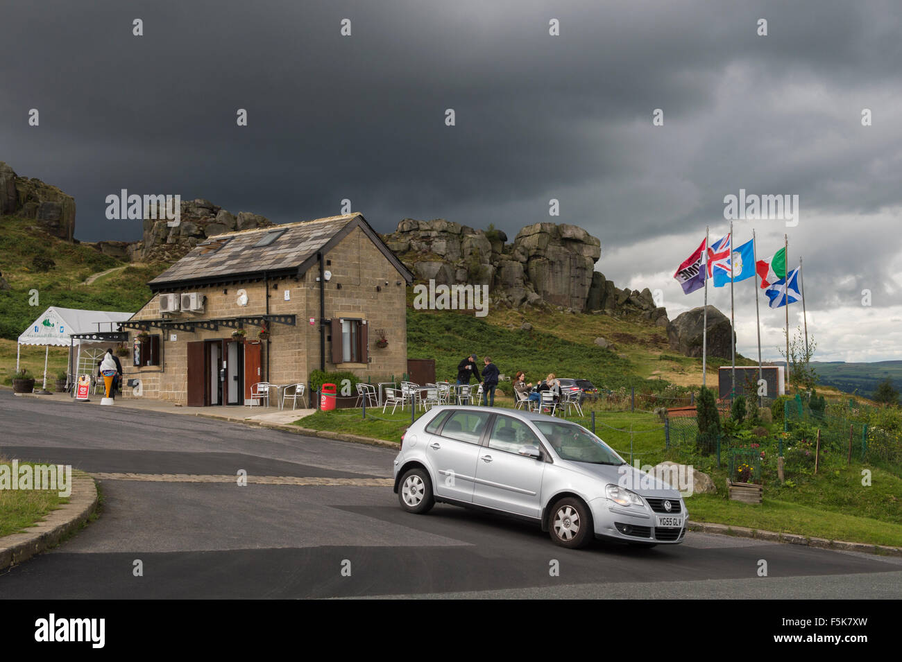Dark grey clouds in sky over café & car park at the Cow and Calf Rocks ...