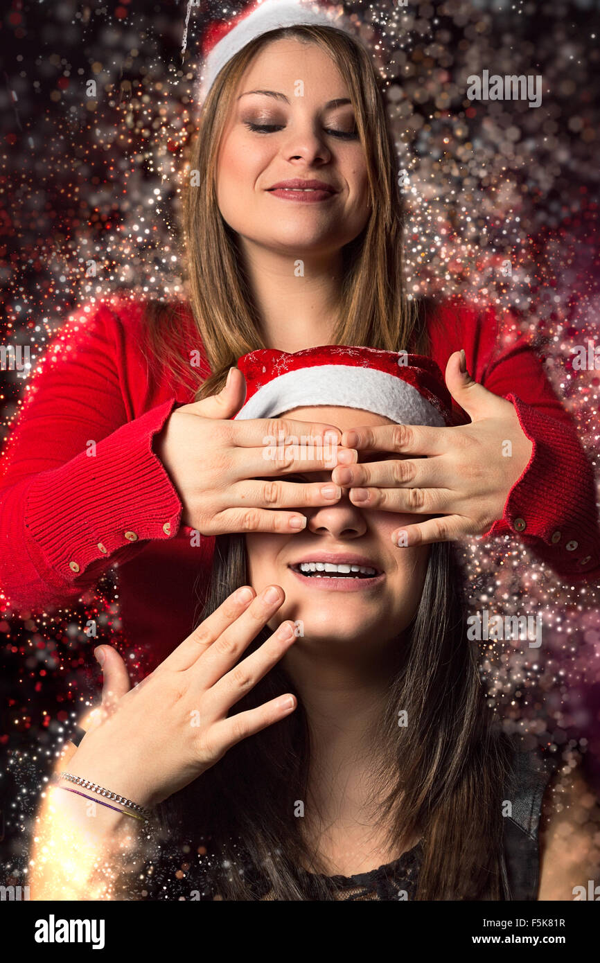 two happy girls for Christmas Stock Photo - Alamy