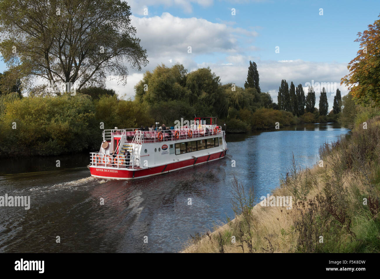 Passengers on sightseeing boat trip (cruise on scenic River Ouse, York ...