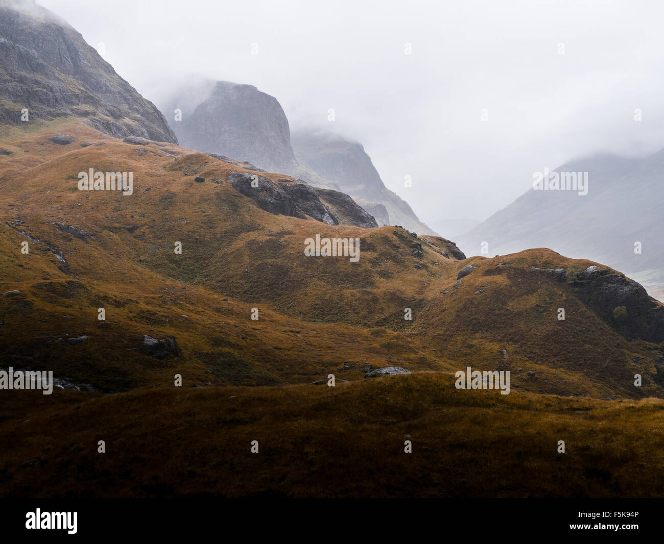 Mist and rain covering the mountains and pass of Glencoe, scottish ...