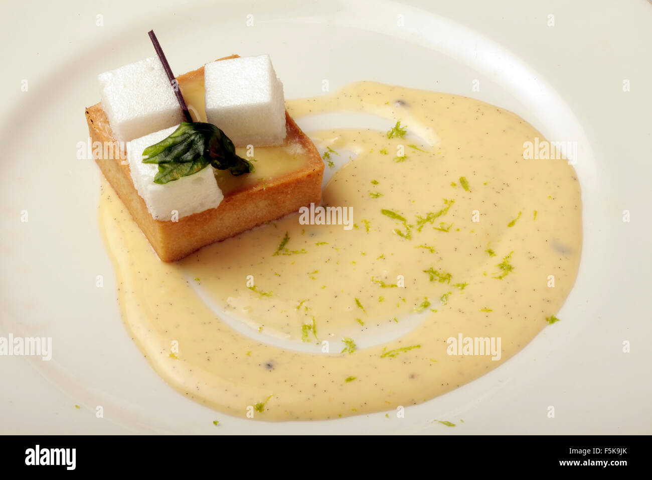 Sweet dessert presentation. Pudding with meringue Stock Photo - Alamy
