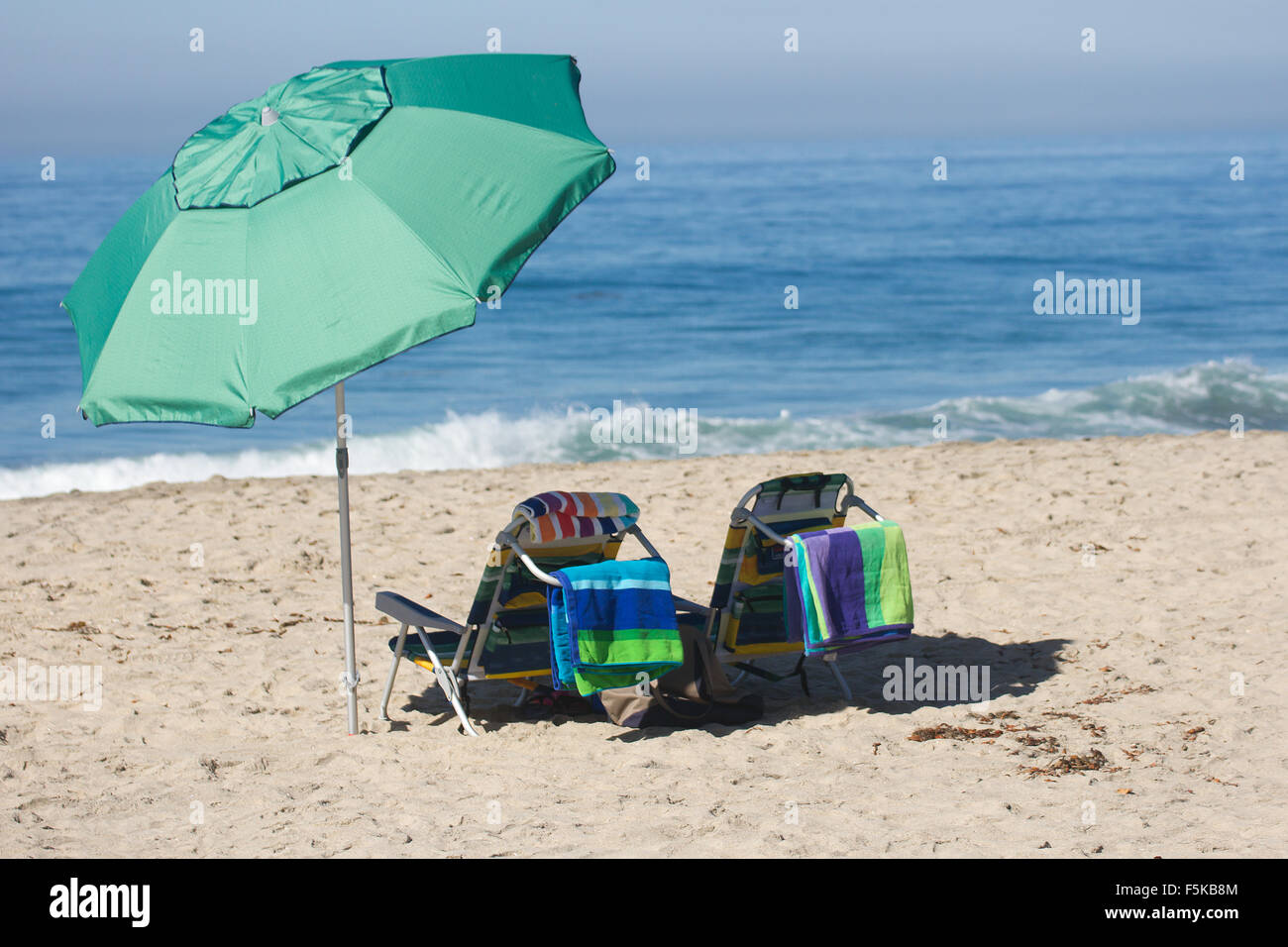 Empty chairs on a beach scene giving the idea of retirement Stock Photo ...