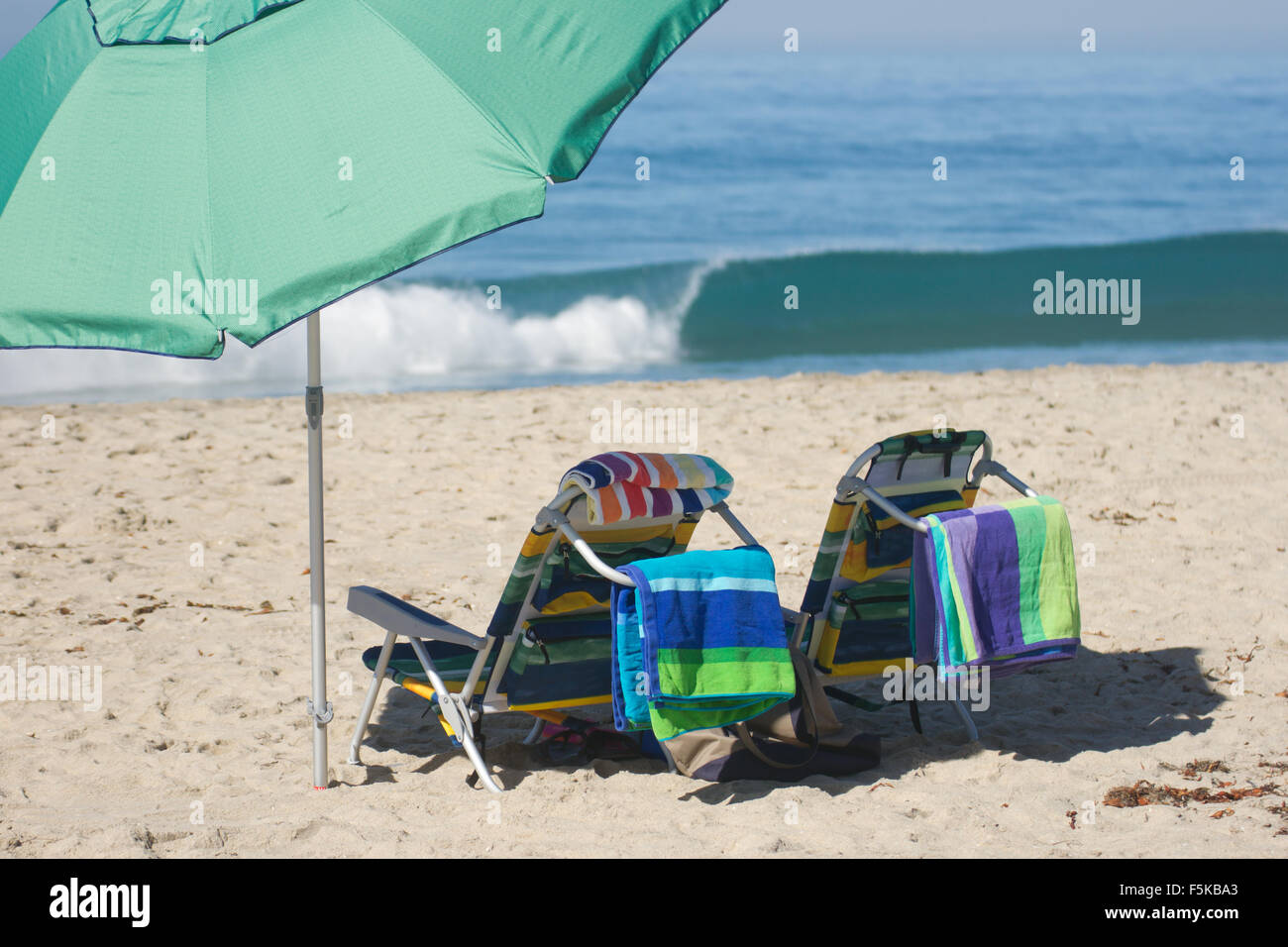 Empty chairs on a beach scene giving the idea of retirement Stock Photo ...