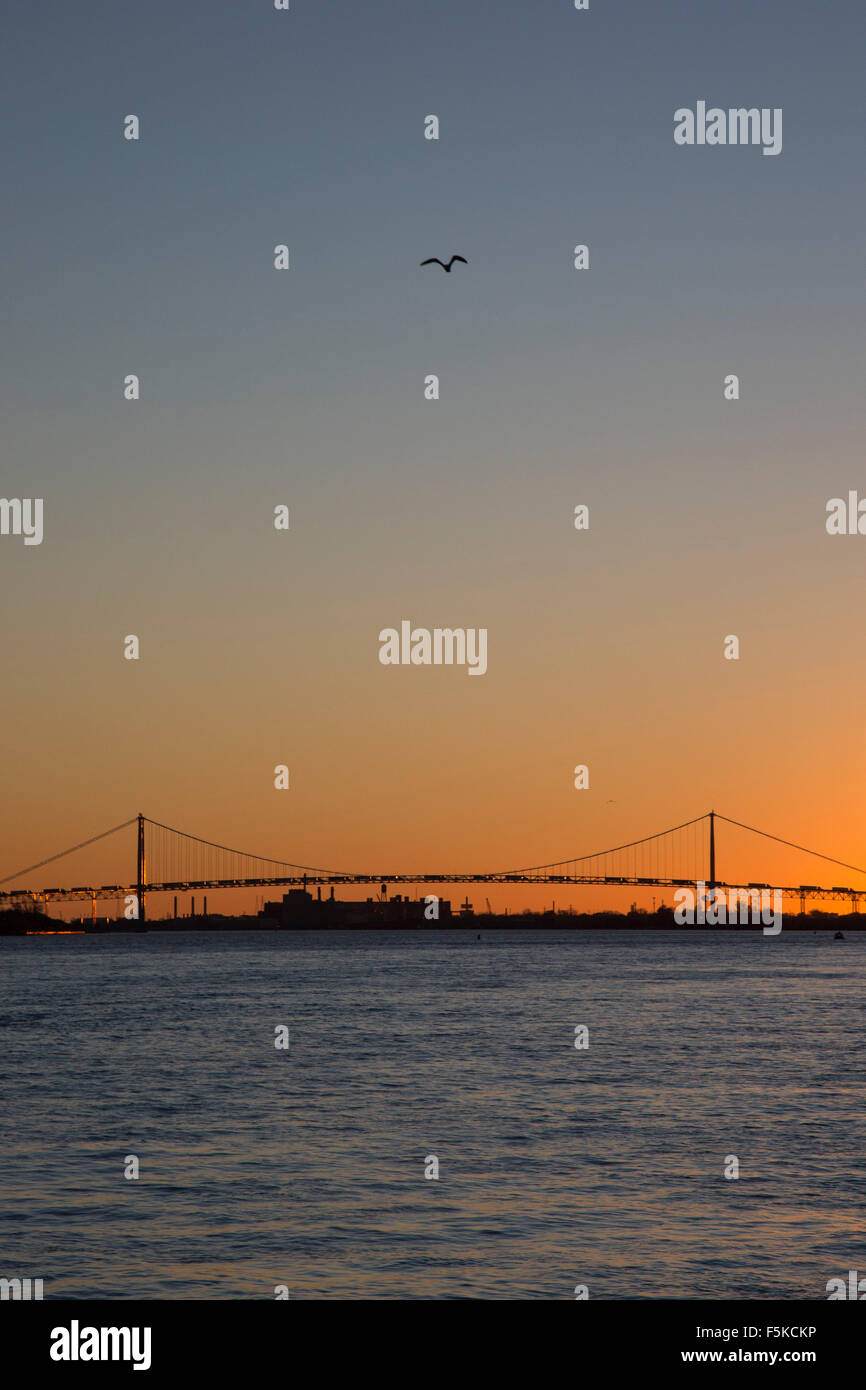 Detroit, Michigan - The Ambassador Bridge at sunset. The bridge links ...