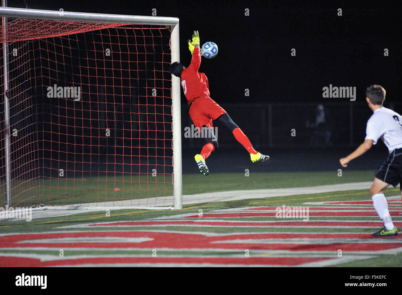 Football goalie diving hi-res stock photography and images - Alamy