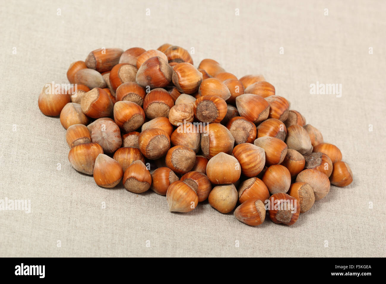 Heap of hazelnuts Stock Photo - Alamy