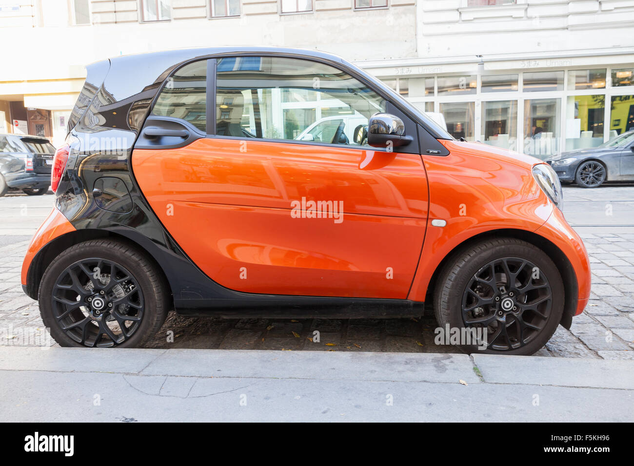 Vienna, Austria - November 4, 2015: Bright red and black Smart Fortwo ...