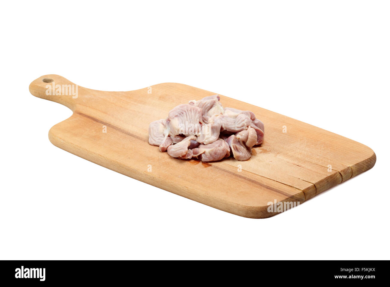Raw Chicken gizzards on cutting board Stock Photo - Alamy