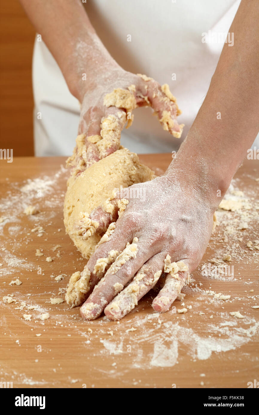 A baker kneading dough. Making Pastry Dough for Hungarian Cake. Series ...