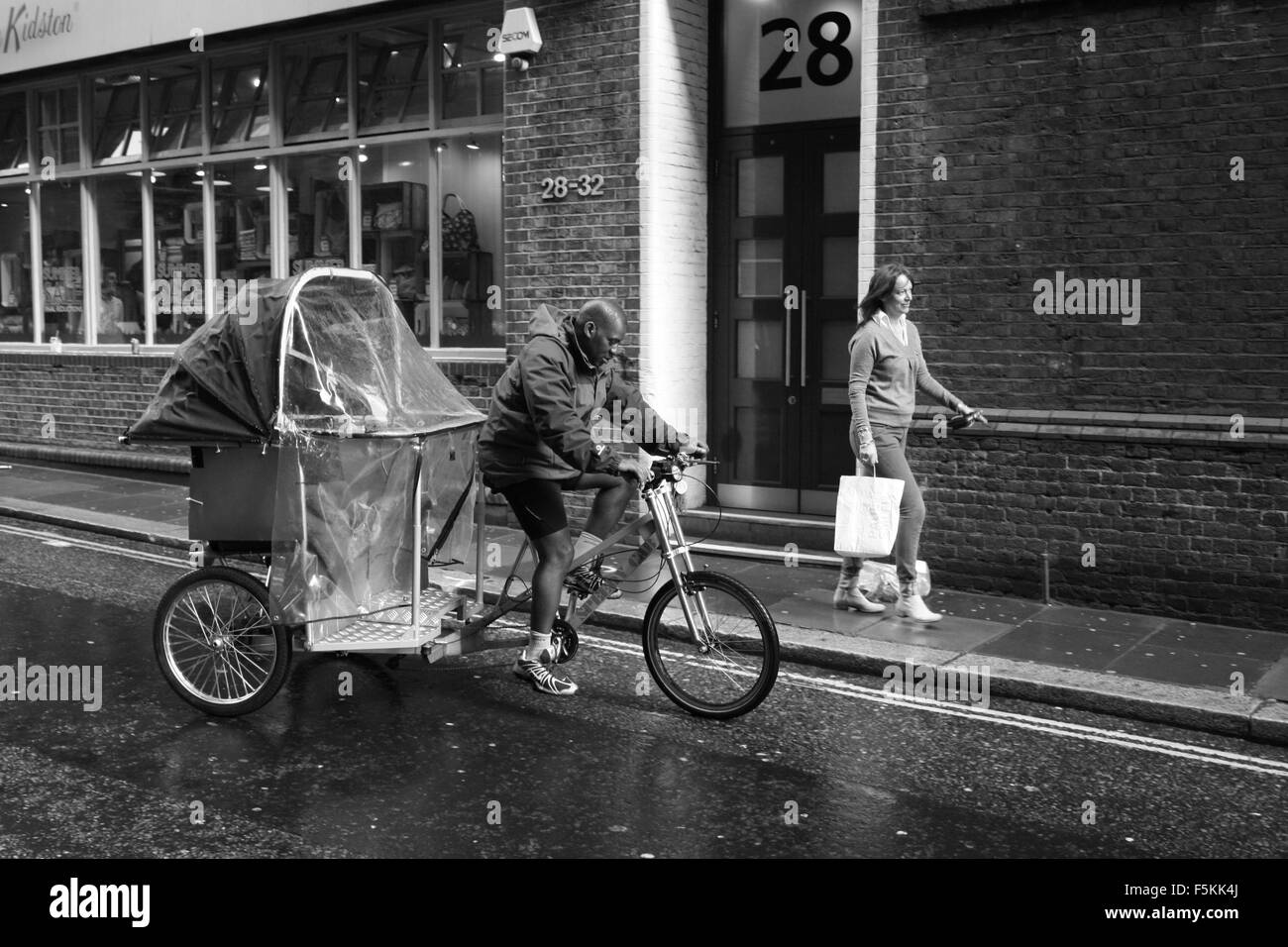 Bike rider on road Black and White Stock Photos & Images - Alamy
