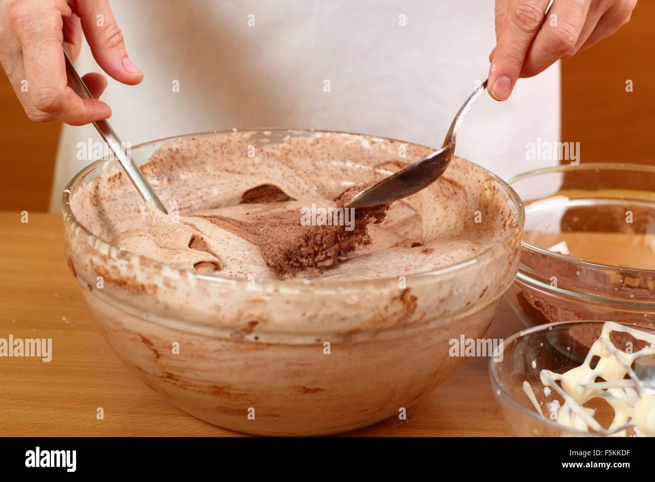 Mixing cocoa powder flour beaten hi-res stock photography and images ...