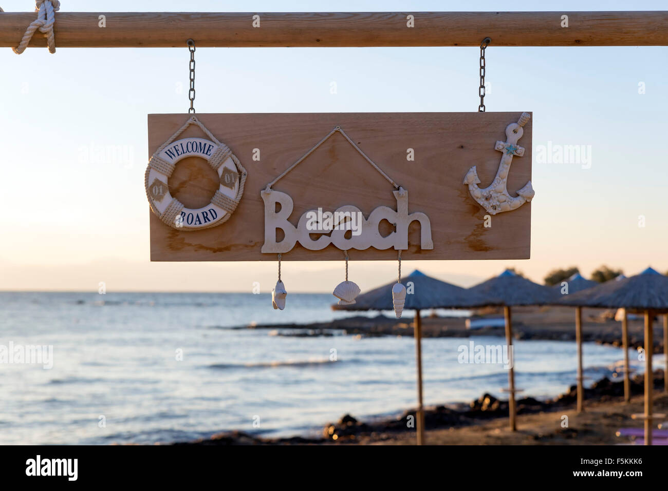 Sign hanging at the entrance to a beach Stock Photo - Alamy