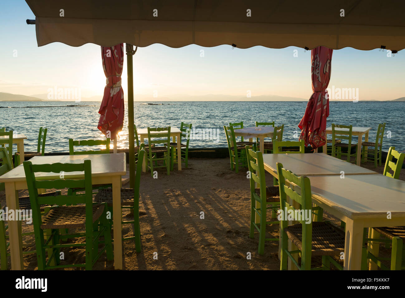restaurant on the beach at sunset Stock Photo - Alamy