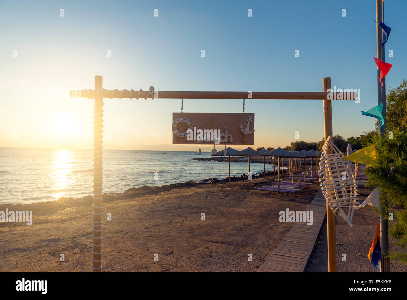 Sign hanging at the entrance to a beach Stock Photo - Alamy