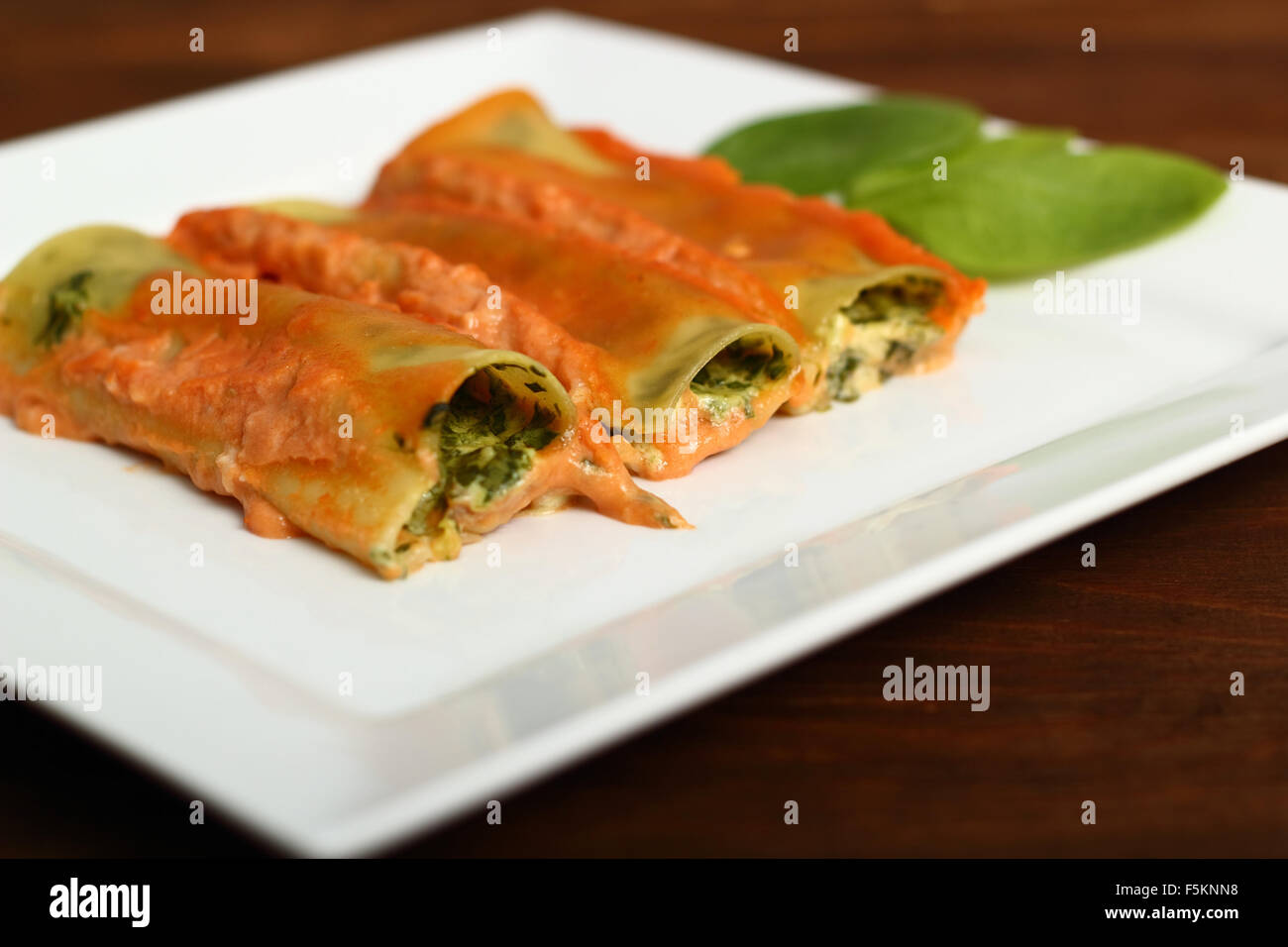 Cannelloni verdi. Pasta with spinach and ricotta Stock Photo - Alamy