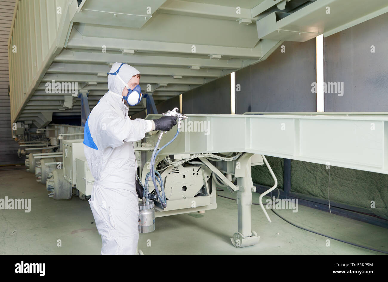 Paint spraying a unit Stock Photo - Alamy