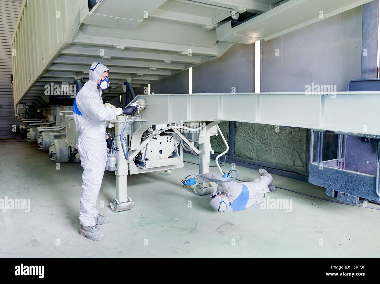 Paint spraying a unit Stock Photo - Alamy