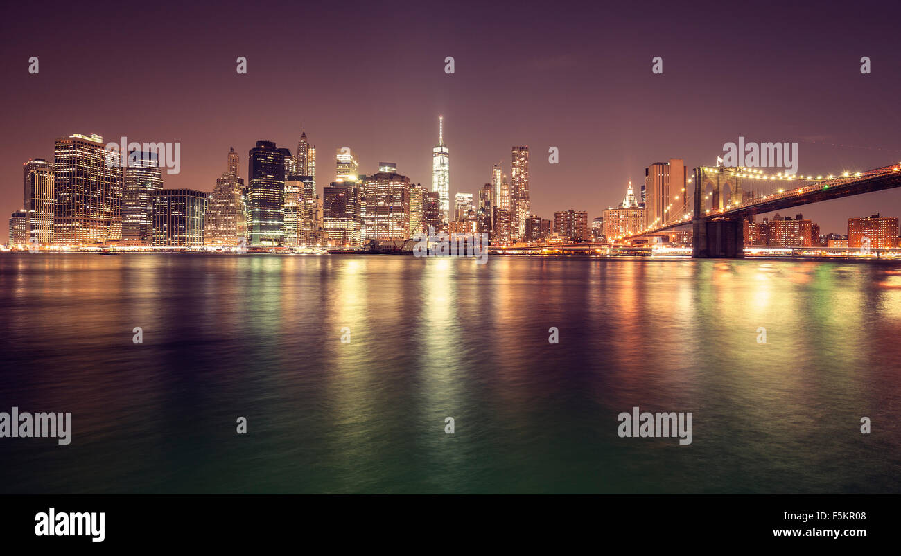 Vintage toned Manhattan waterfront at night, New York City, USA Stock ...