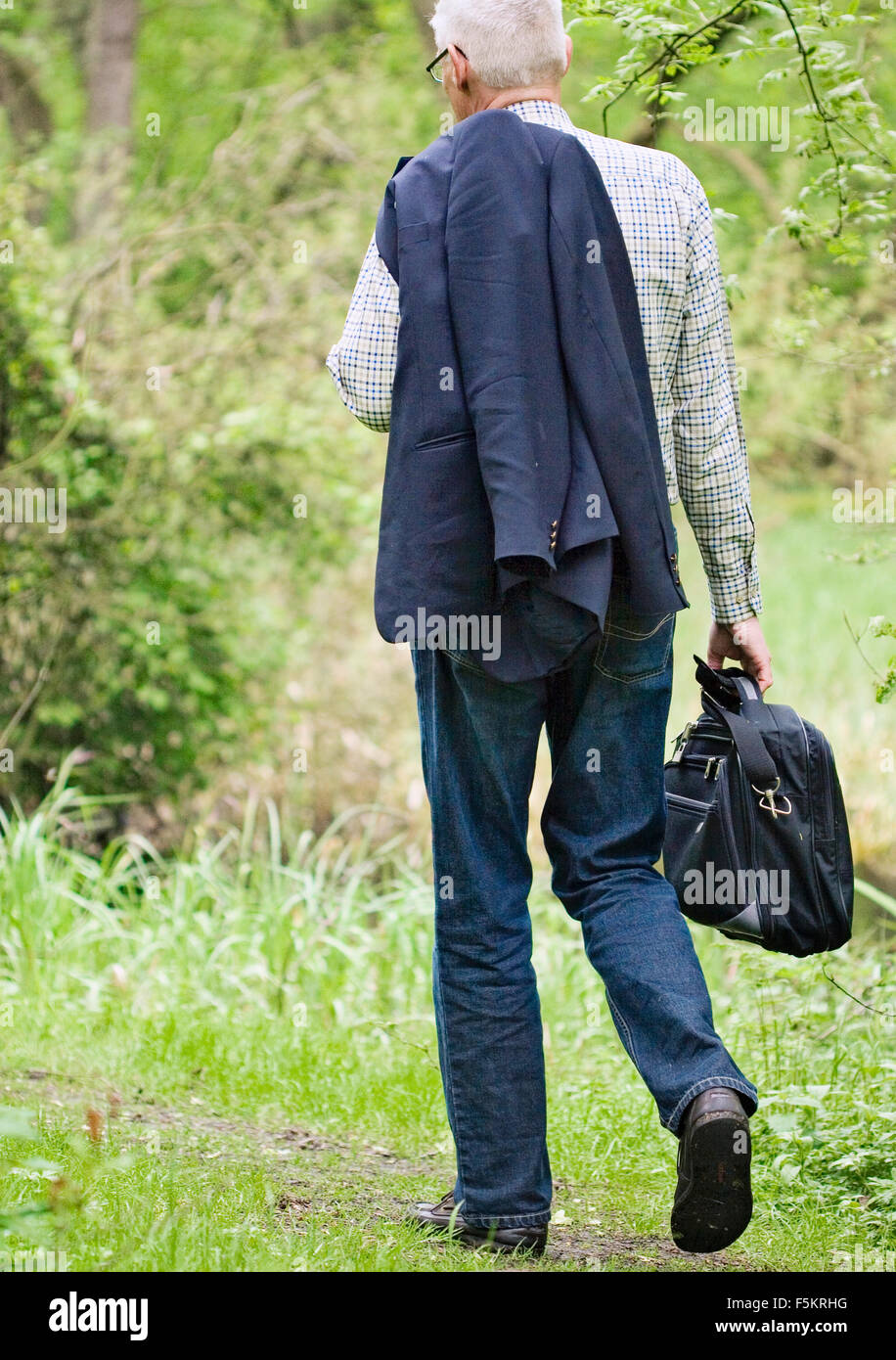 Rear man walking hi-res stock photography and images - Alamy