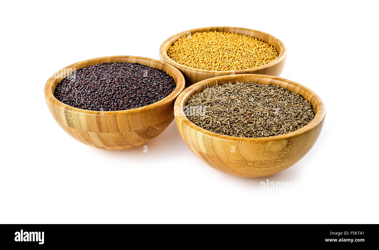 Traditional Asian cooking spices isolated in bamboo bowls Stock Photo ...