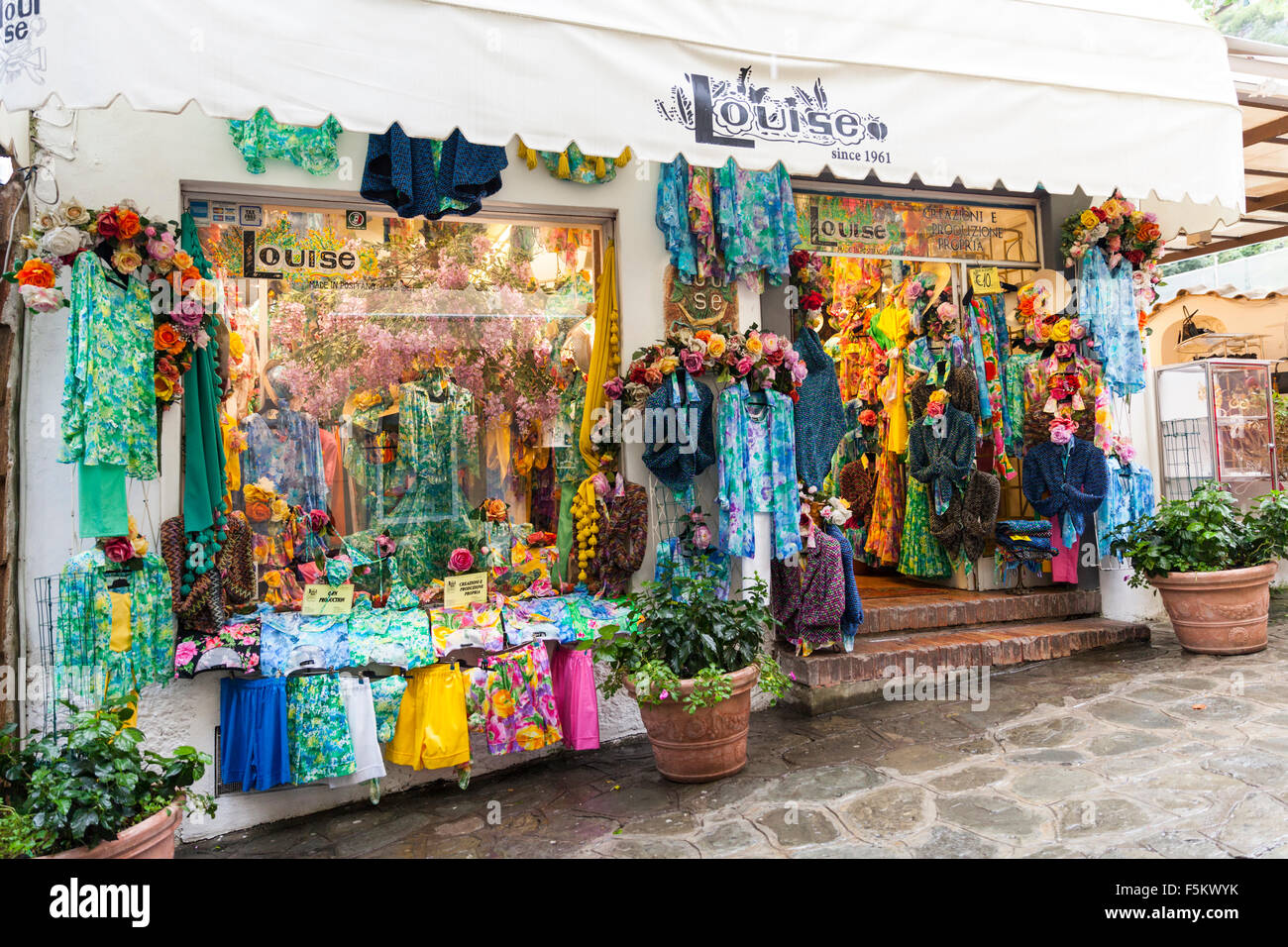 Colorful shop window of Louise Moda,selling clothing and bright ...