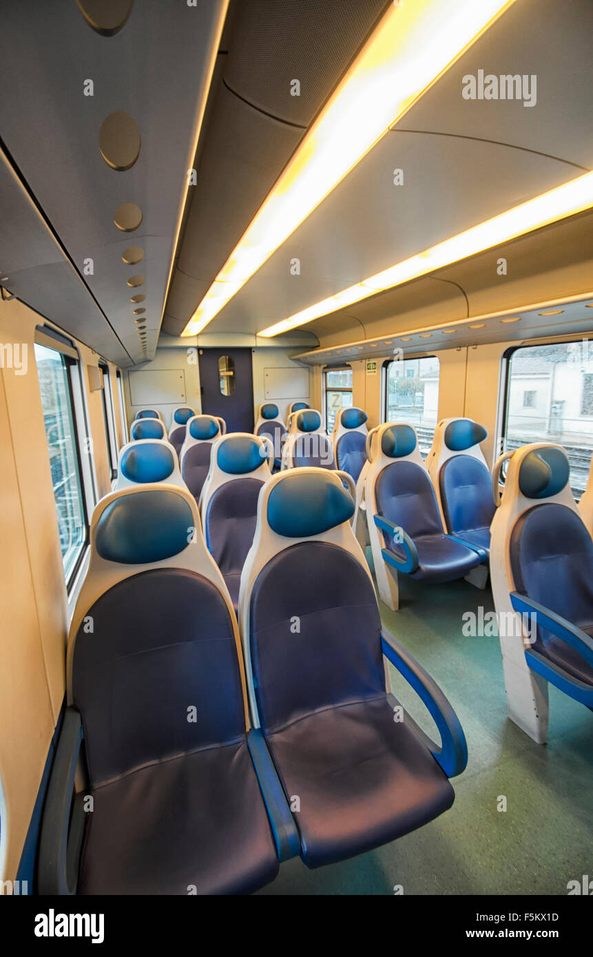 Interior of empty train stopped at the station Stock Photo - Alamy