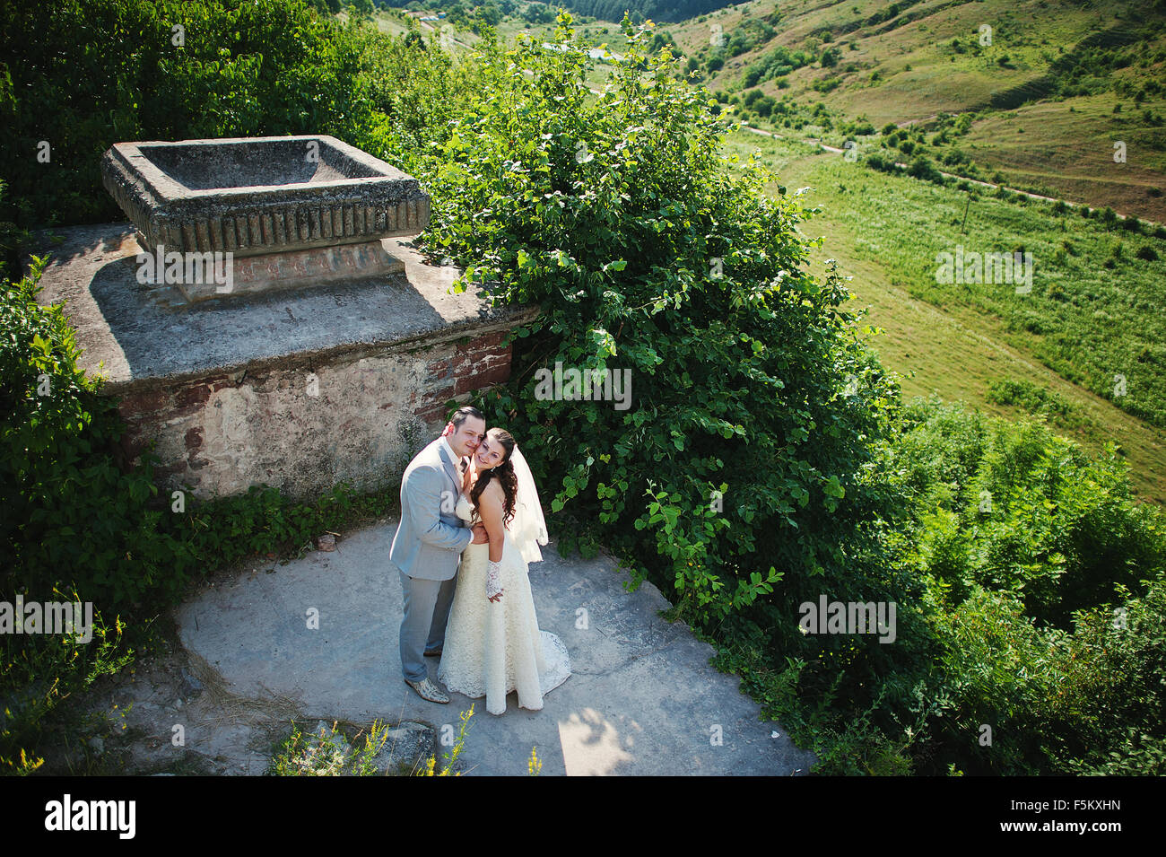 wedding couple on the scenic landscape Stock Photo - Alamy