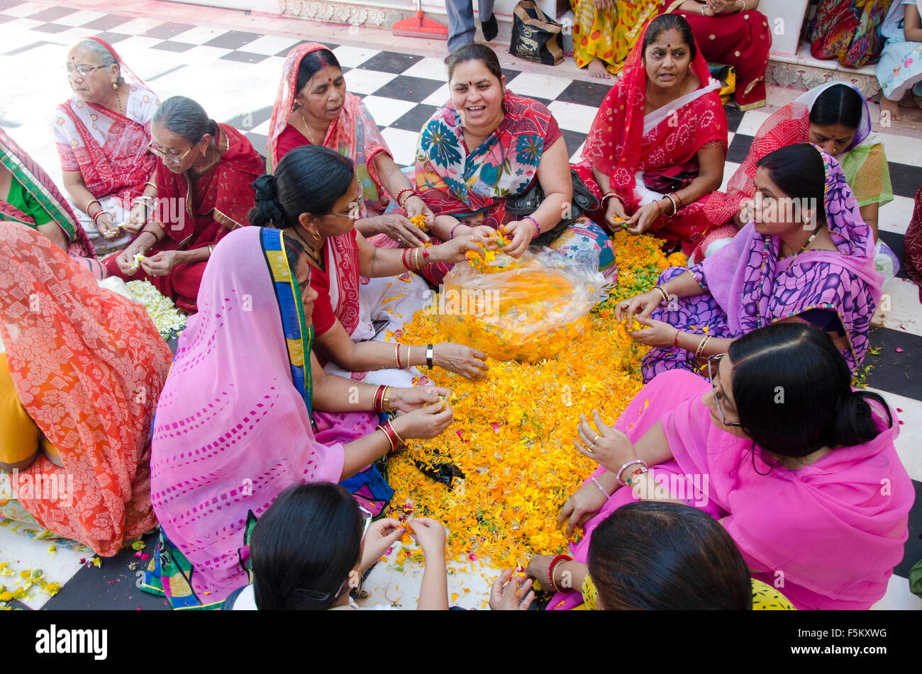 Flower Plucking Woman Sitting High Resolution Stock Photography and ...