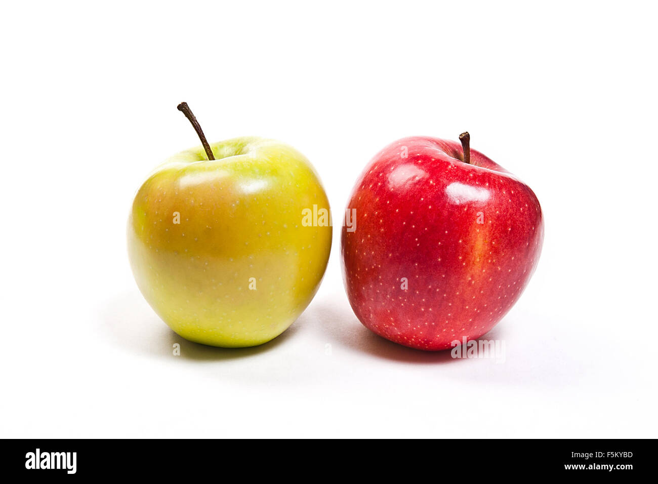 Single red apple and one green apple. Juicy ripe fruits. Isolated on ...