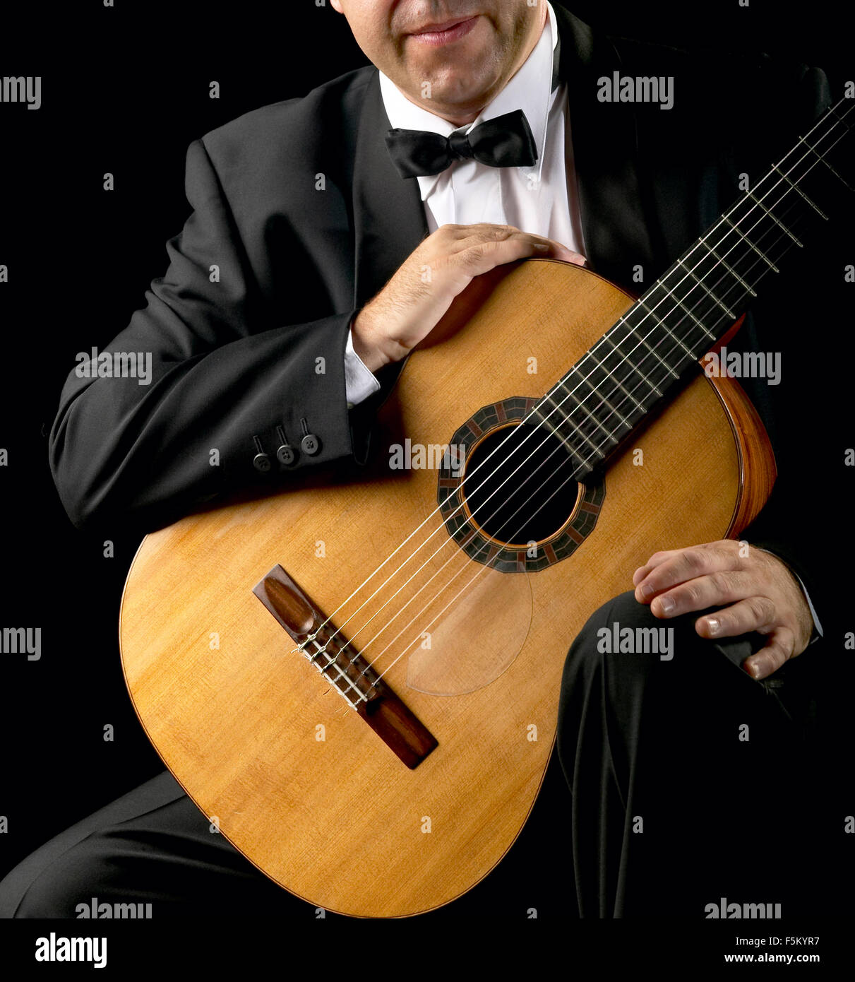 Classical Guitarist with Smoking Jacket low key image square format ...