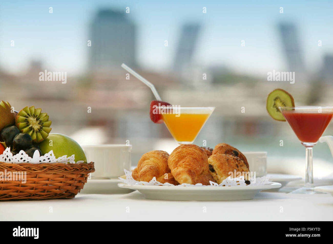 Breakfast in a terrace of Madrid Hotel with buildings in the background ...