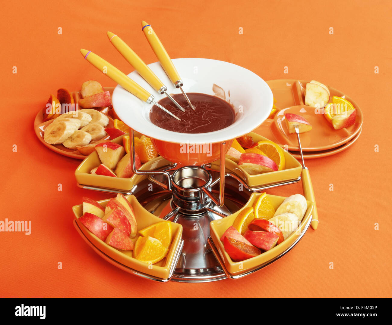 Chocolate fondue with fruits Stock Photo - Alamy