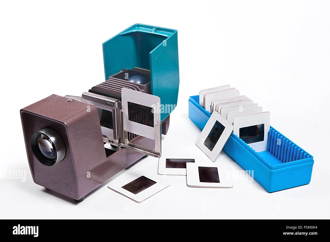 Retro cine-projector on the white background. Old projector for ...