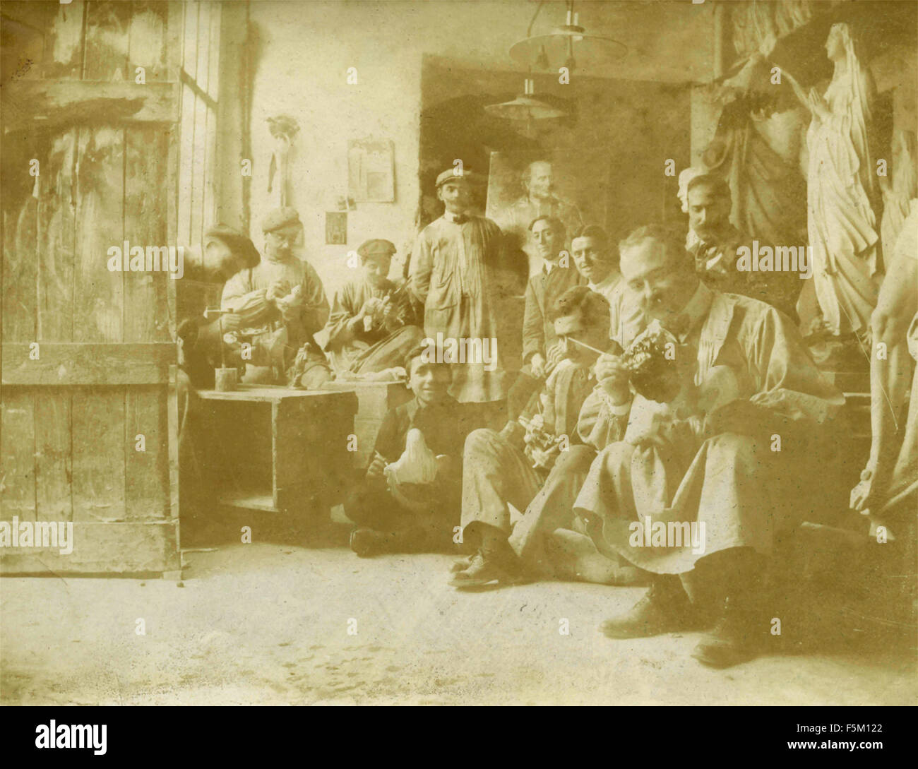 A group of workers in the shop, Italy Stock Photo - Alamy