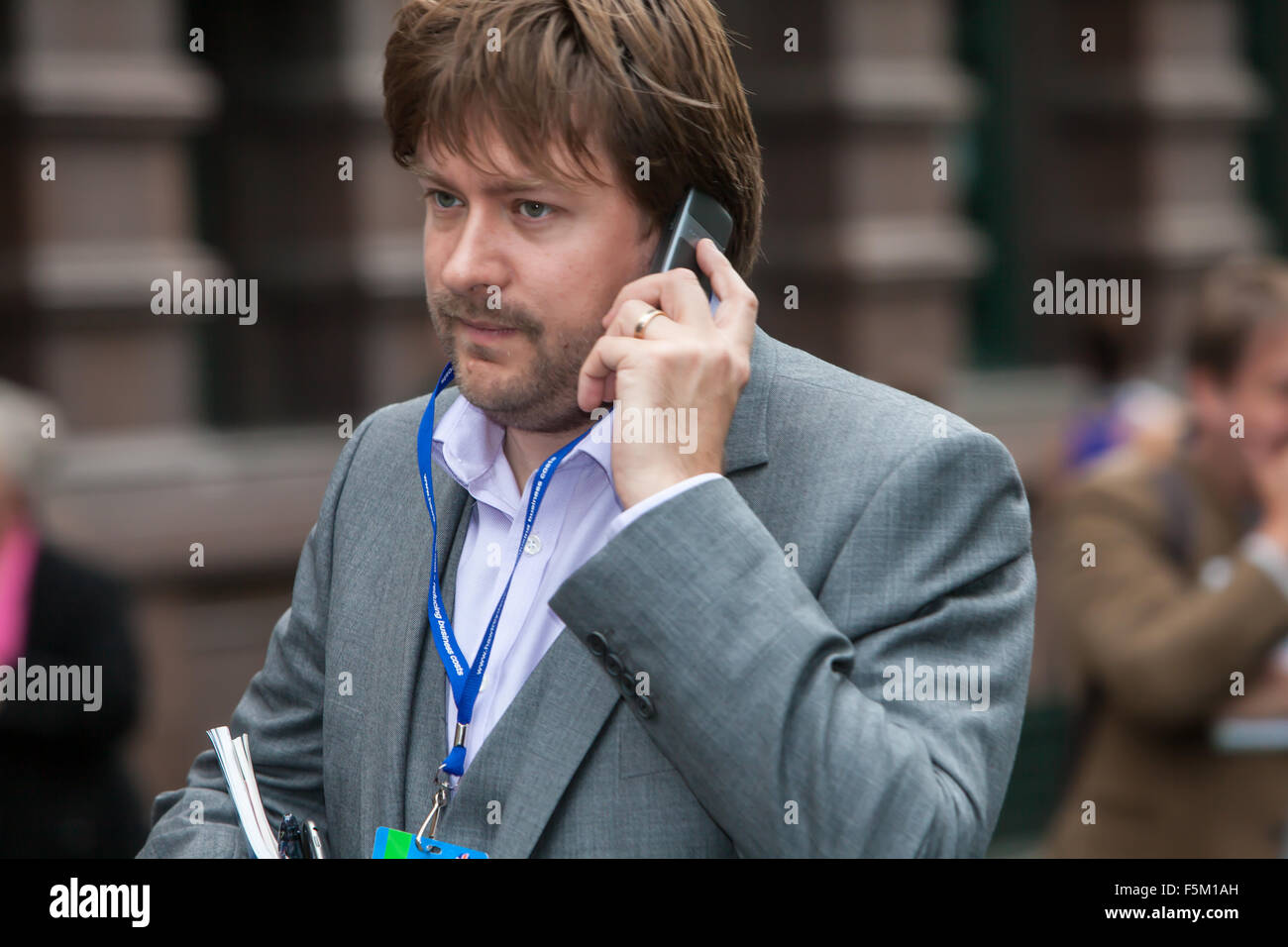 on the phone Stock Photo - Alamy