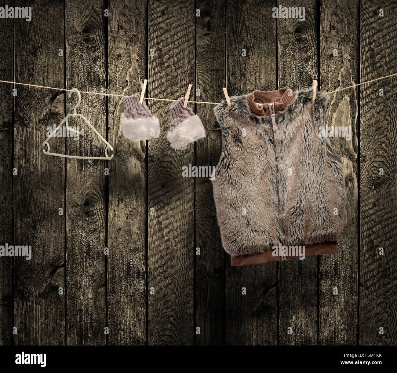 women's winter clothes on a clothesline Stock Photo - Alamy