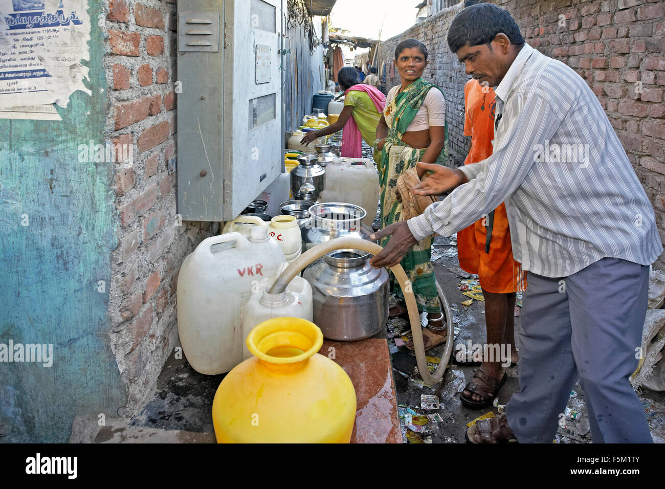 Queue for collecting drinking water slum in mumbai, maharashtra, india ...