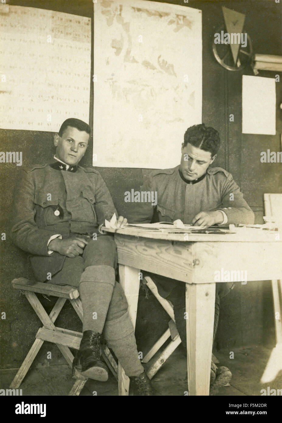 Officers sitting at a table hi-res stock photography and images - Alamy