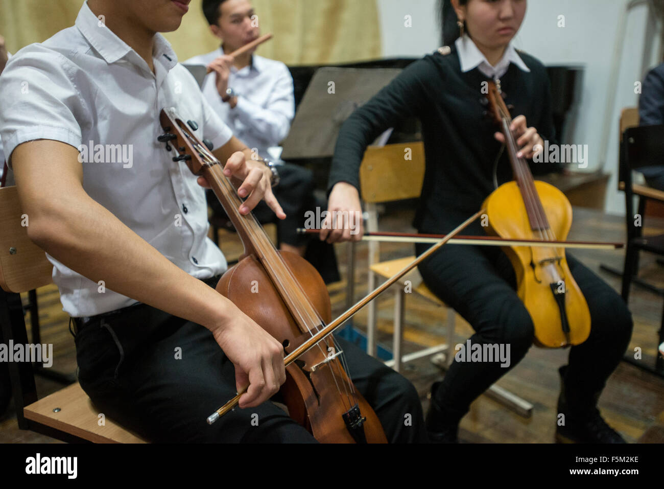 Kyrgyz authentic musical instruments orchestra play with conductor ...
