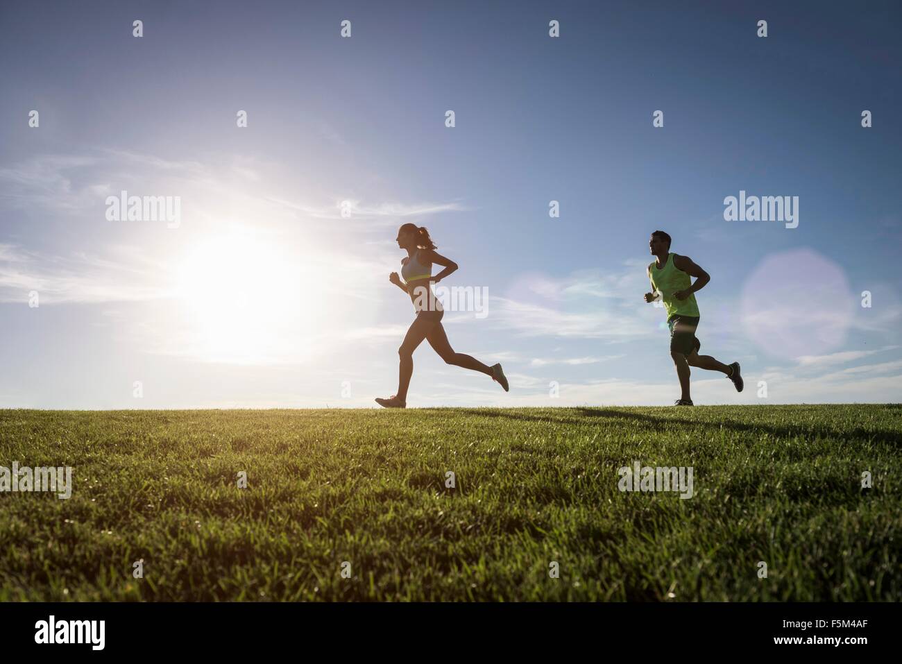 Woman running in park fitness hi-res stock photography and images - Alamy