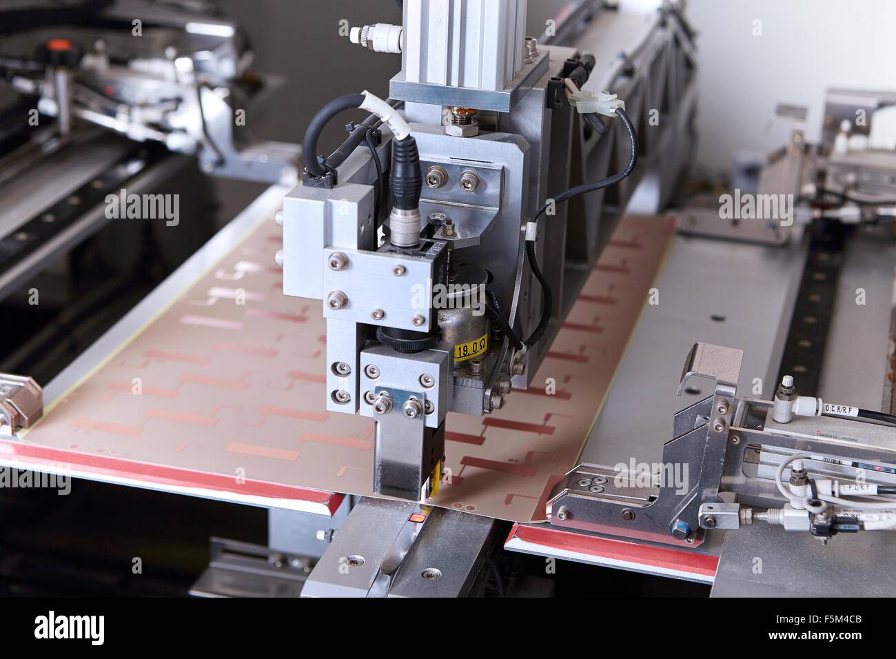 Sheet of flexible circuits on cutting tool Stock Photo - Alamy
