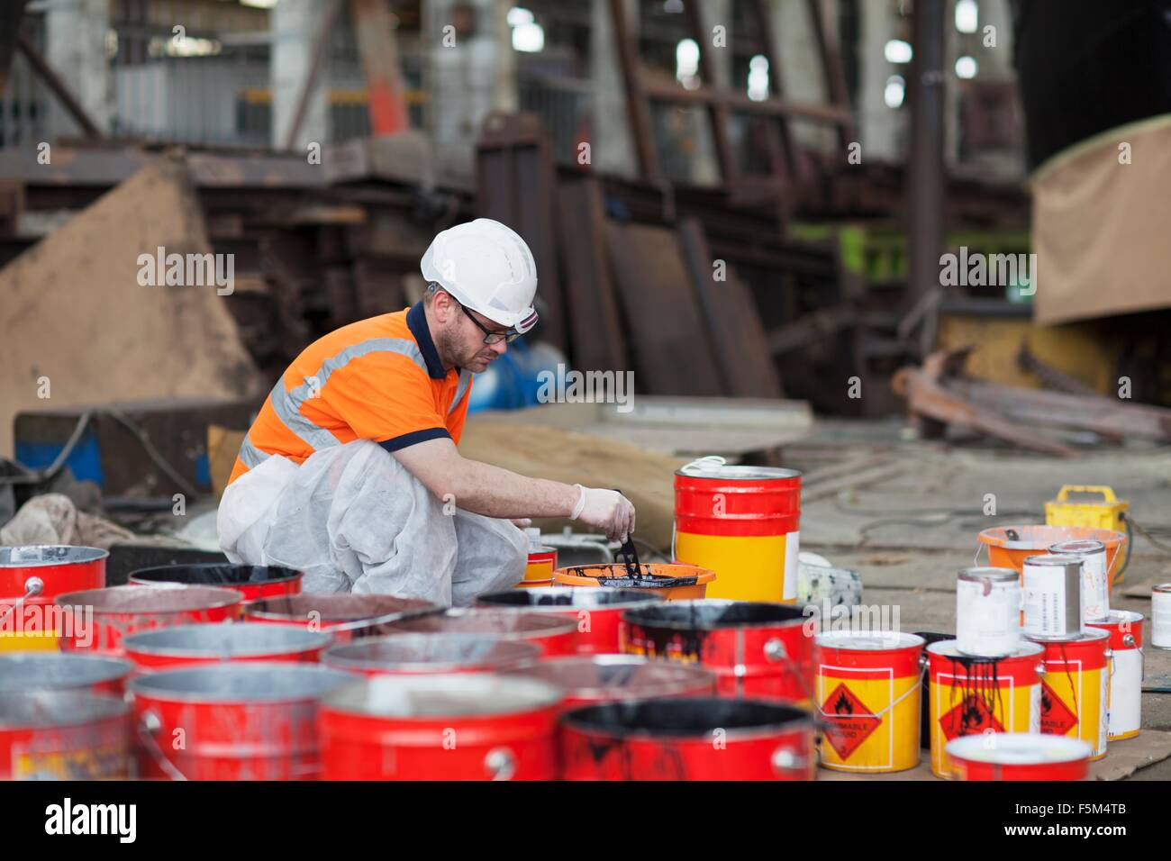 Worker in safety jacket hi-res stock photography and images - Alamy