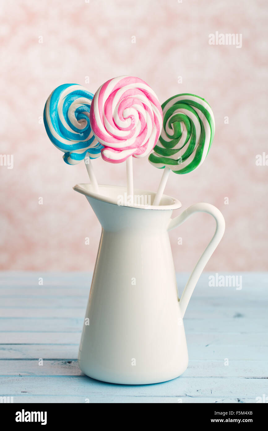 colorful swirl lollipop on table Stock Photo - Alamy