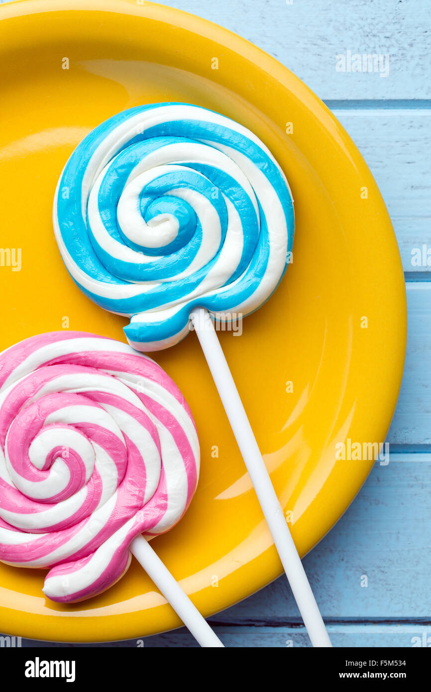 top view of colorful swirl lollipop Stock Photo - Alamy