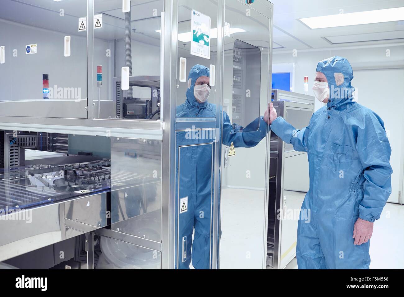 Clean room suit hi-res stock photography and images - Alamy